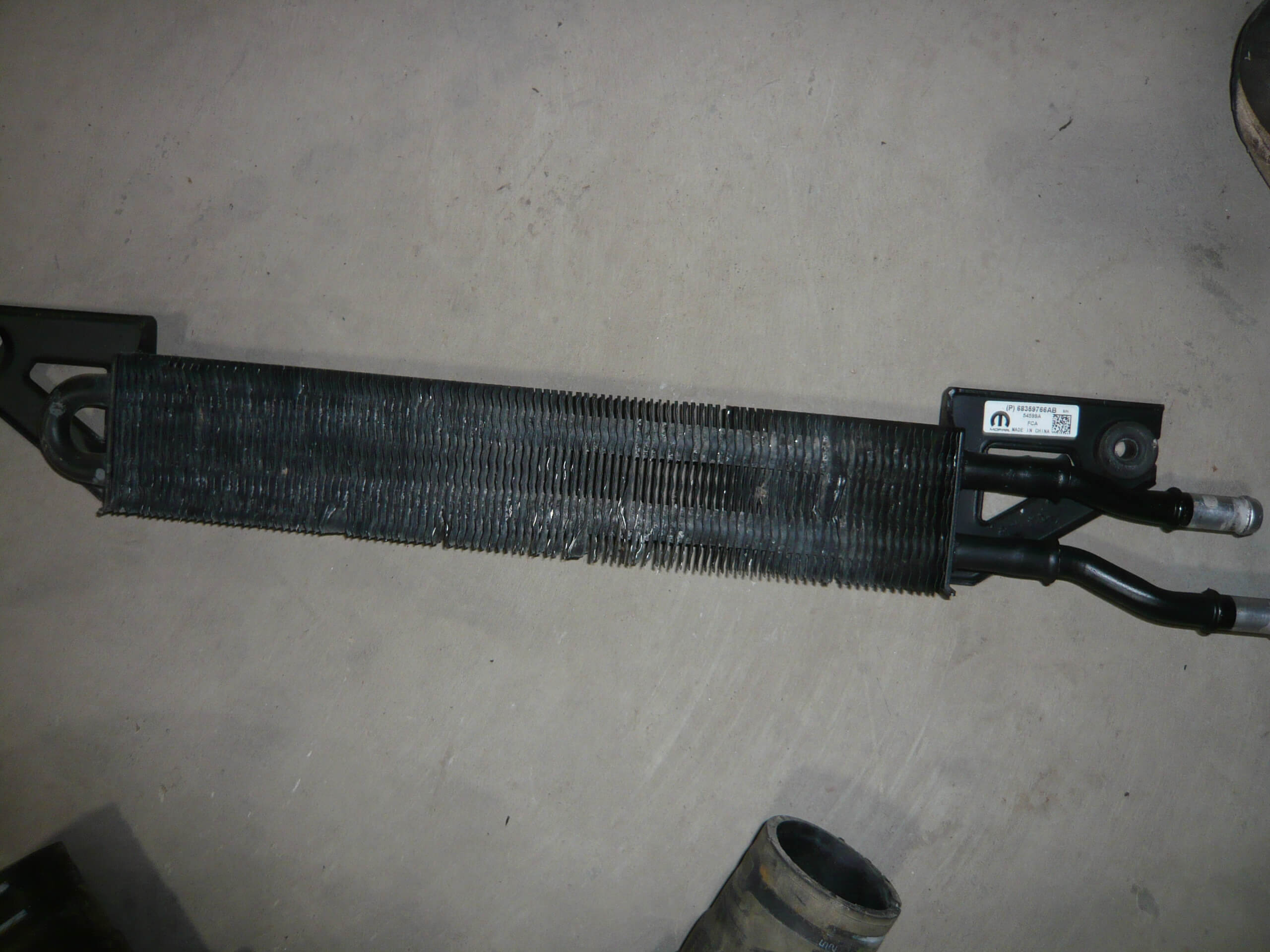 6.7L – Power Steering Cooler – 2019 + – Used – One Stop Goat Shop